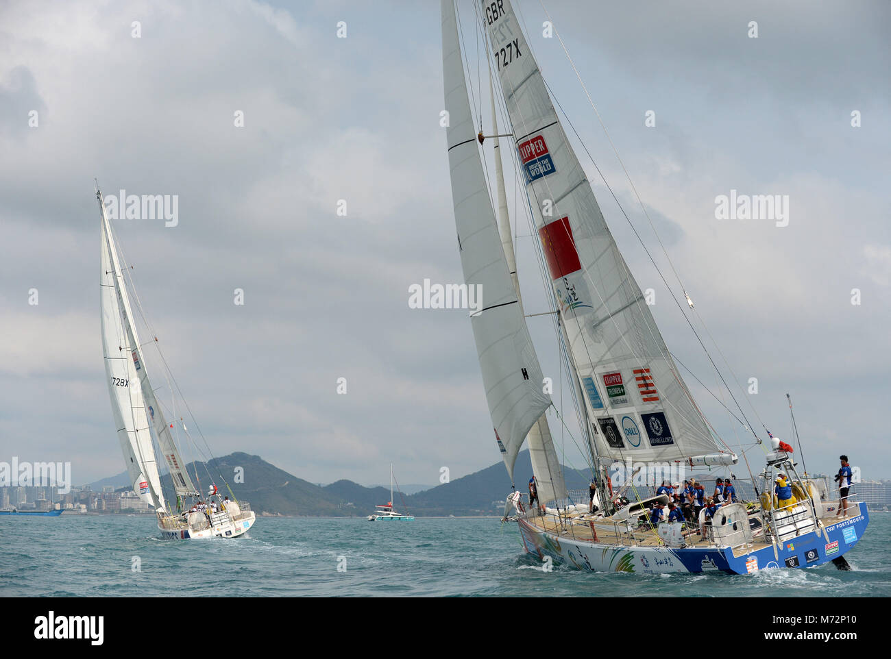 Clipper 70 yachts are seen competing as they depart Hainan on the start ...