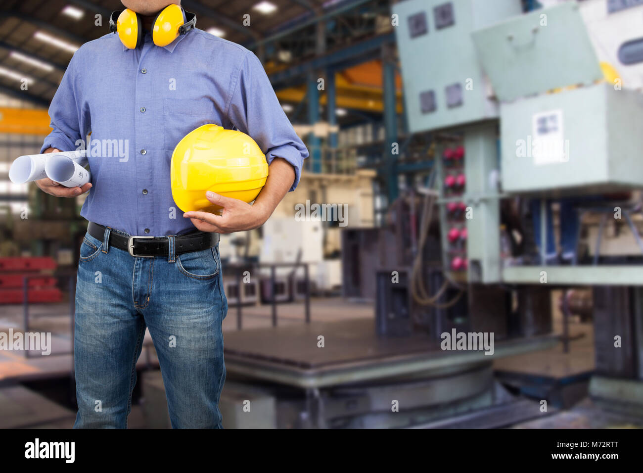Engineer in the area of the factory Stock Photo - Alamy