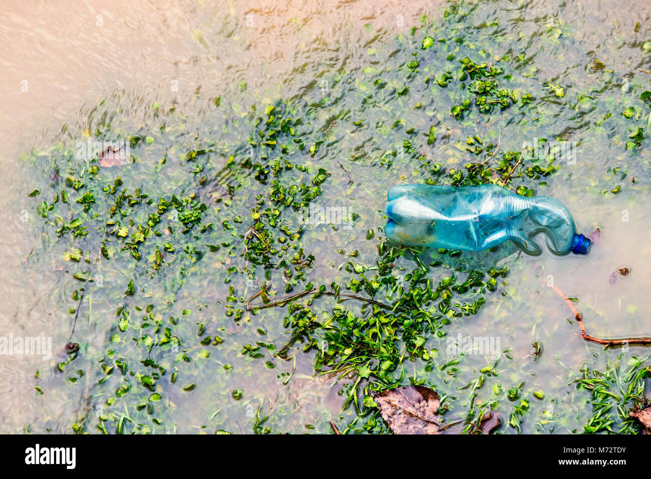 Plastic garbage in the river , pollution and environment concept Stock ...