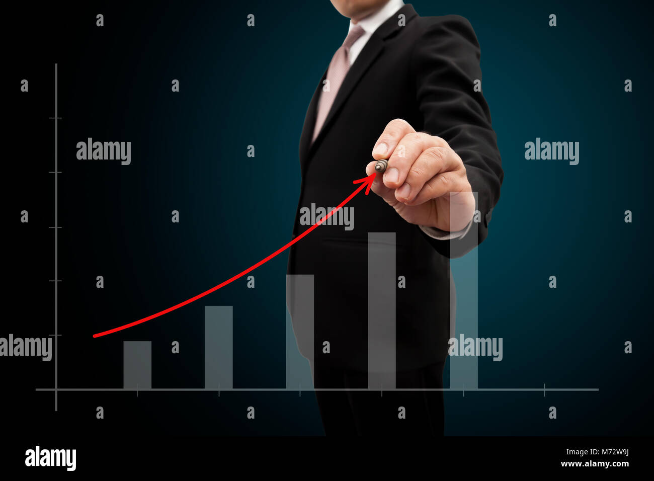 Businessman with growth chart of profits Stock Photo - Alamy