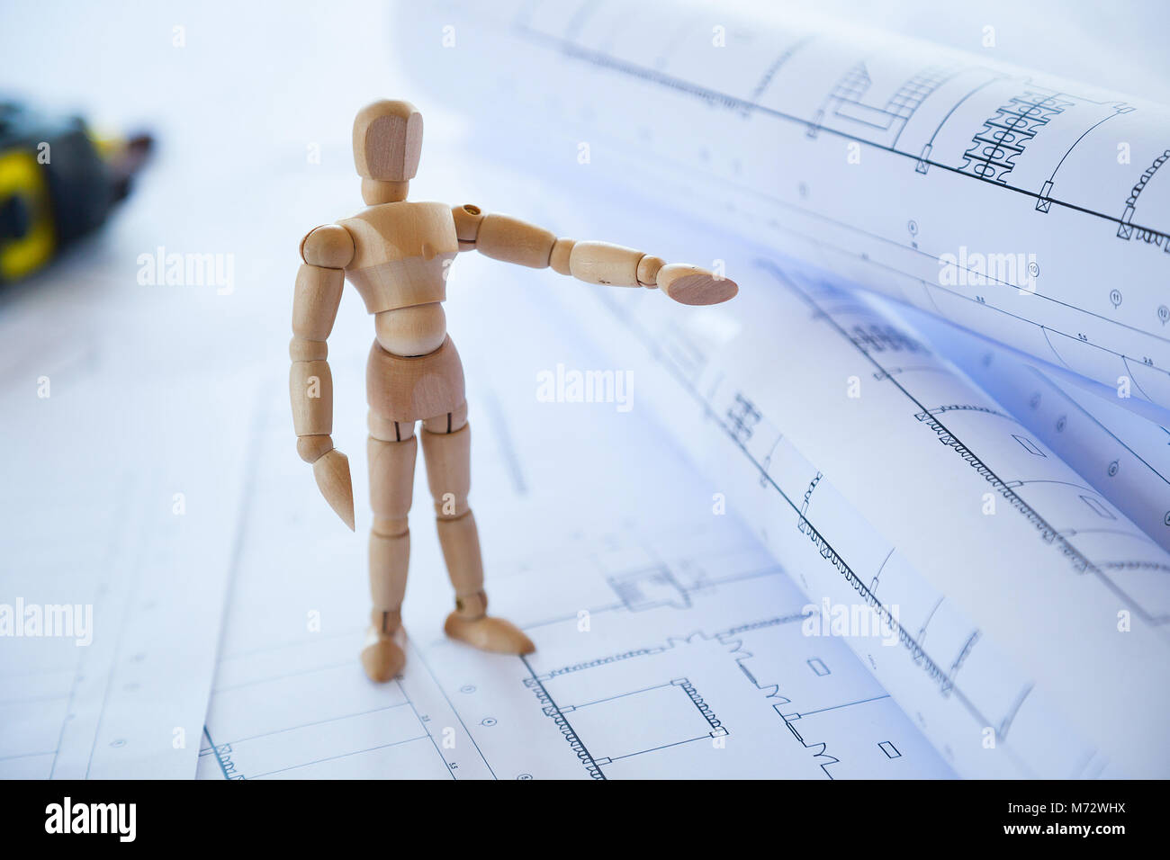 Drawing doll with the part of construction project Stock Photo - Alamy