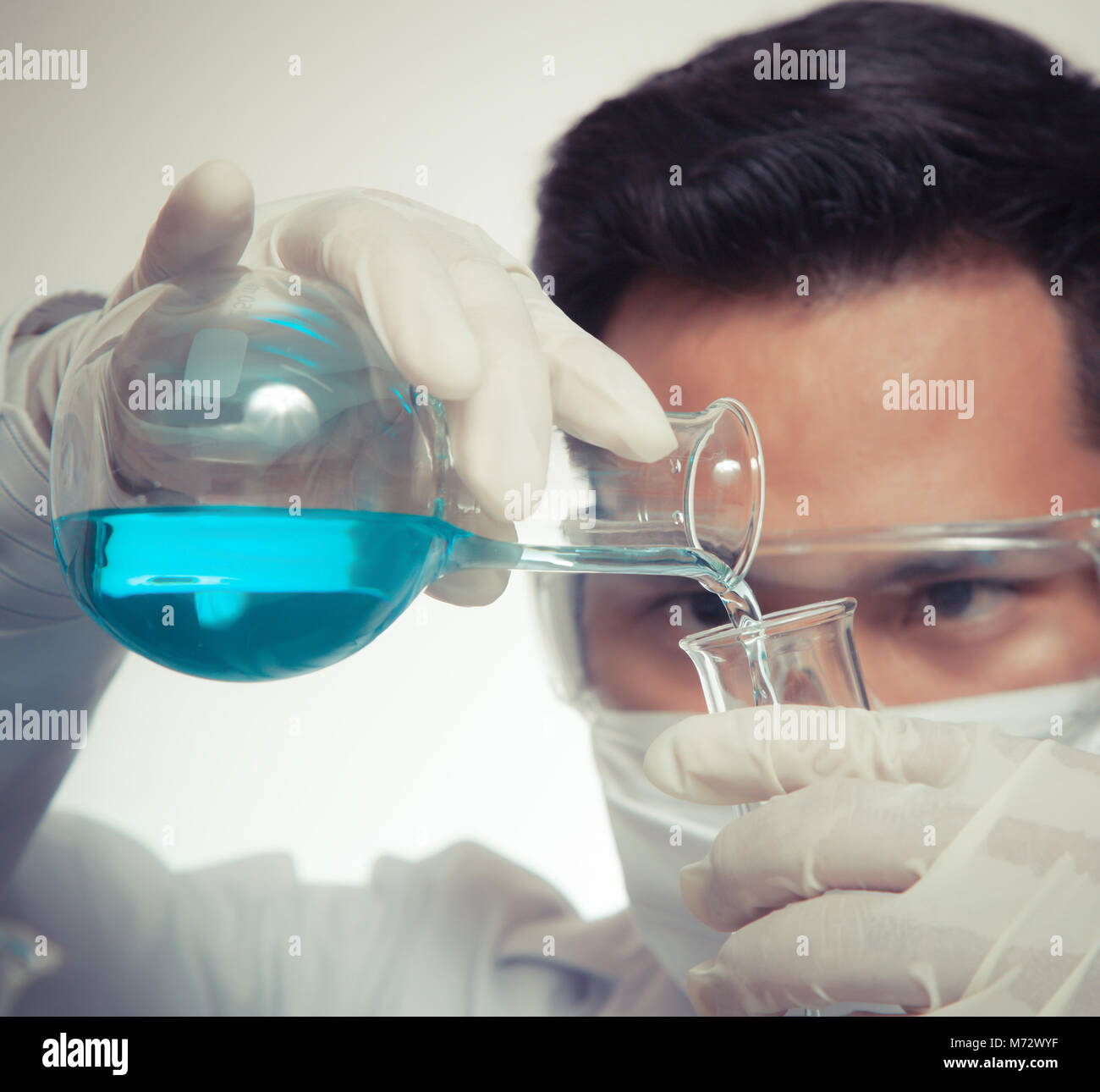 Scientists are experimenting in the lab Stock Photo - Alamy