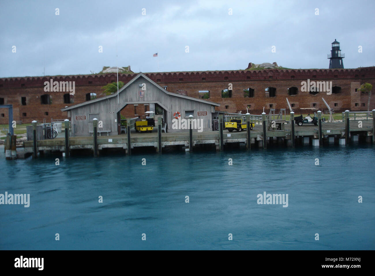 Main dock and boathouse from Garden Key Harbor Stock Photo - Alamy