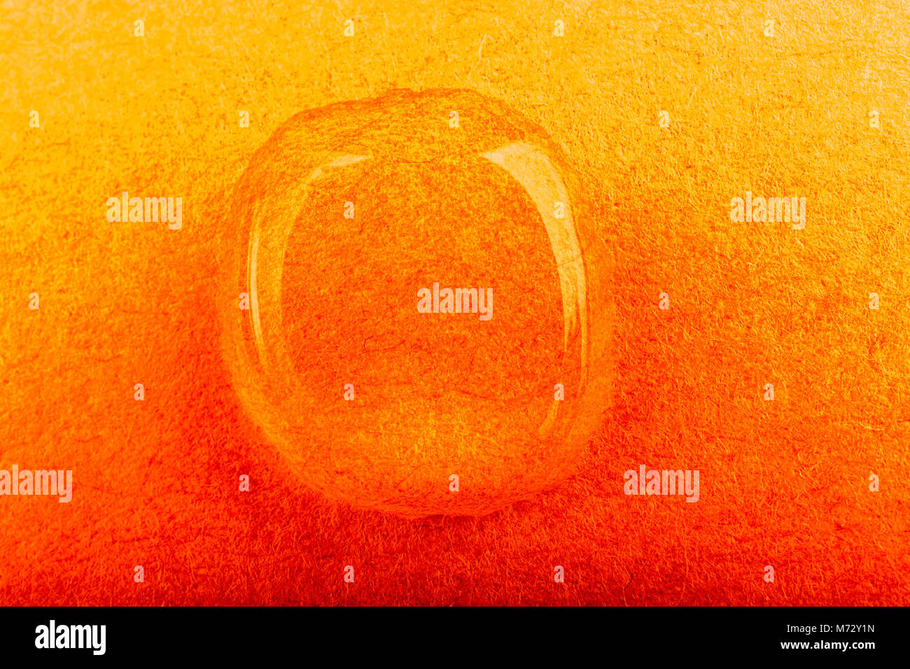 Round water drops in close-up view on colorful background Stock Photo ...