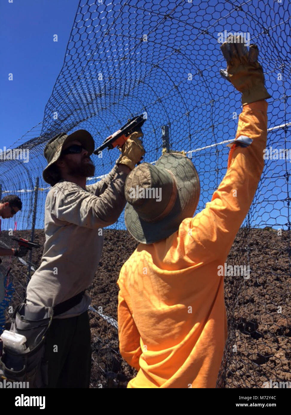 fence crew at work Stock Photo - Alamy