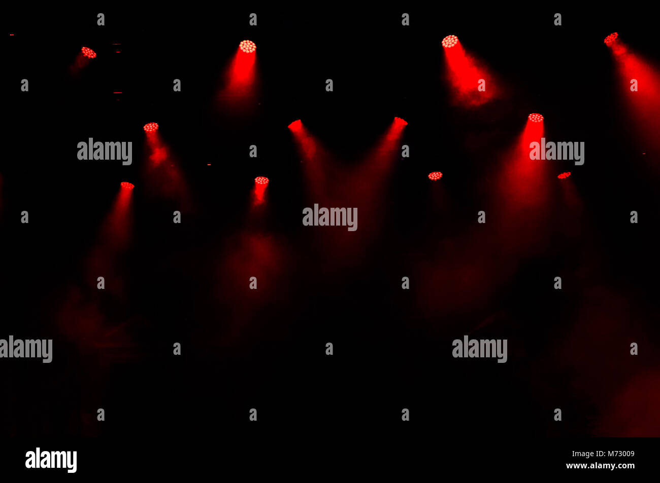 Red stage lights during a rock concert Stock Photo - Alamy