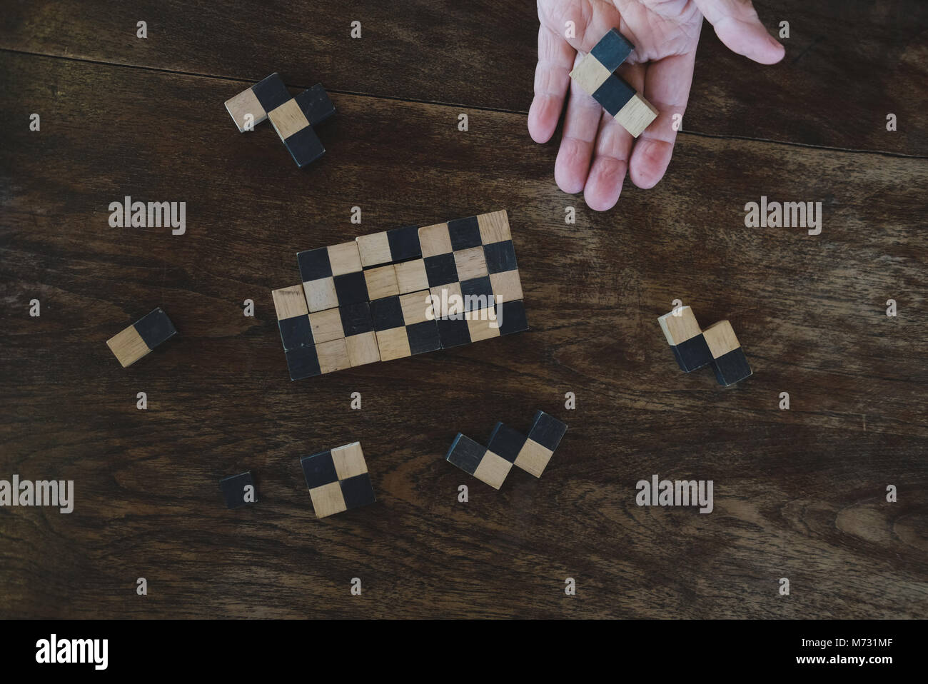 cubic wood block puzzle game. education and leisure concept. growth ...