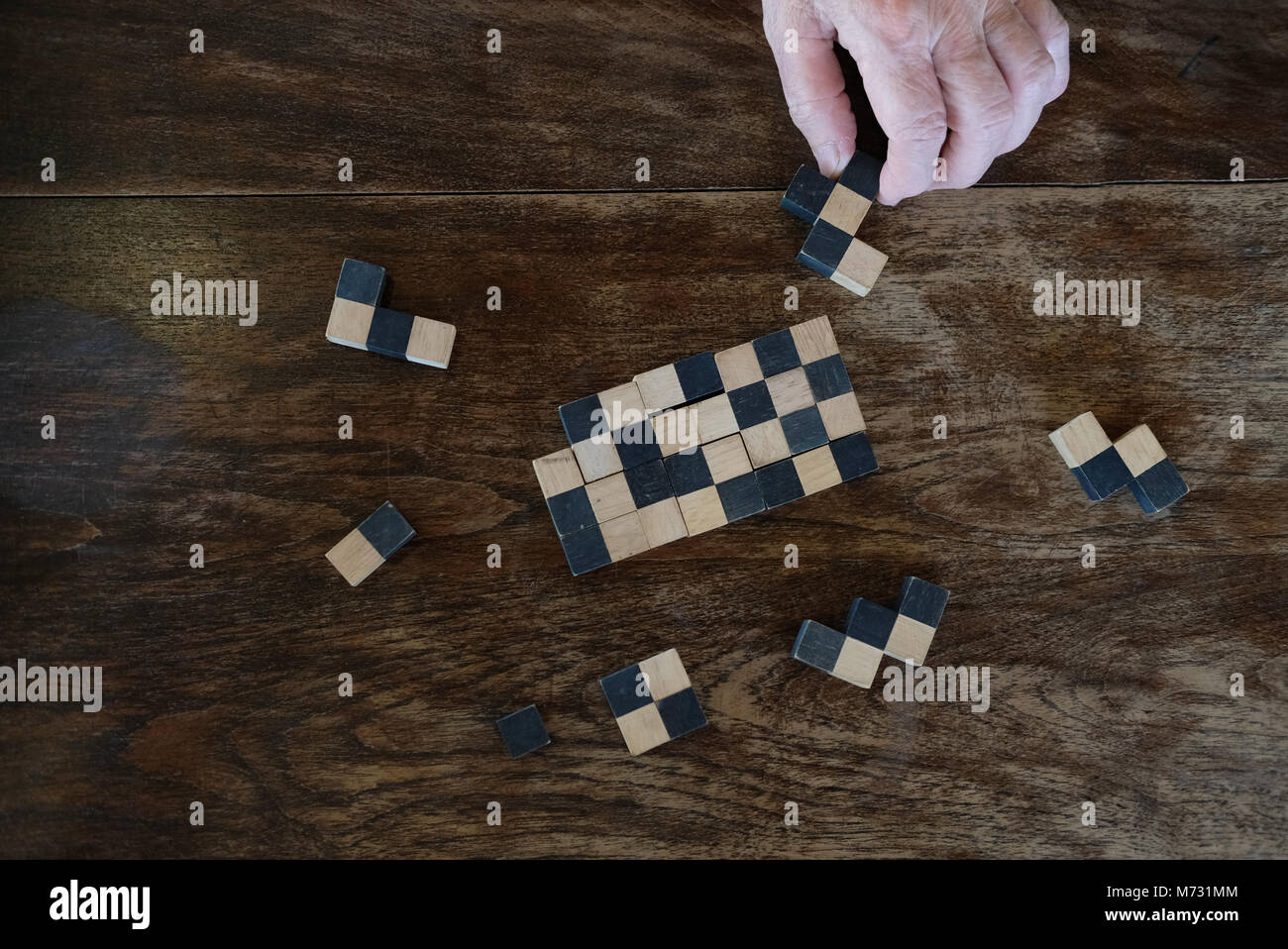 cubic wood block puzzle game. education and leisure concept. growth ...