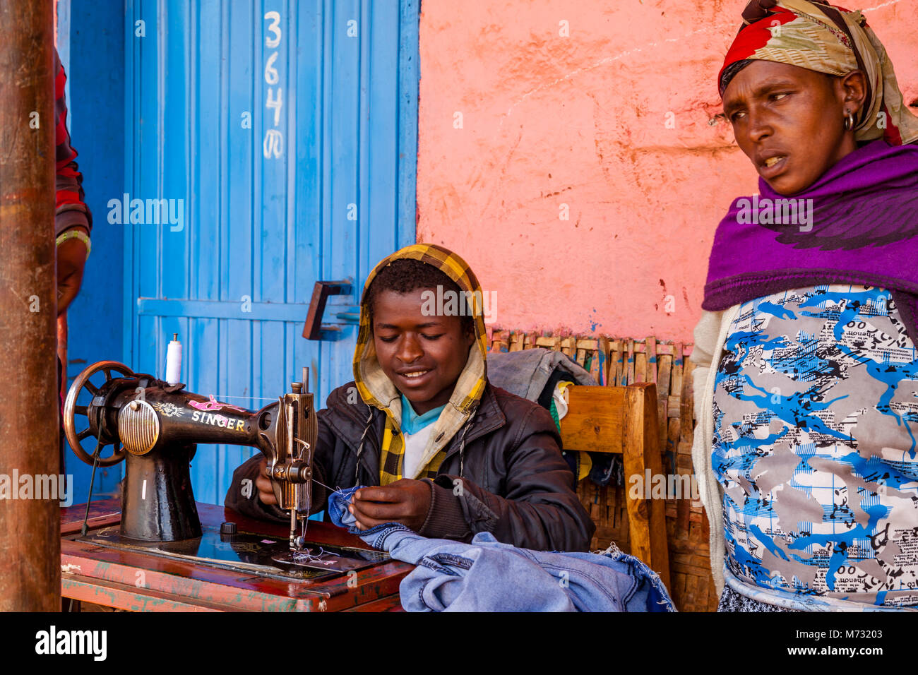 African man sewing machine in hi-res stock photography and images - Alamy