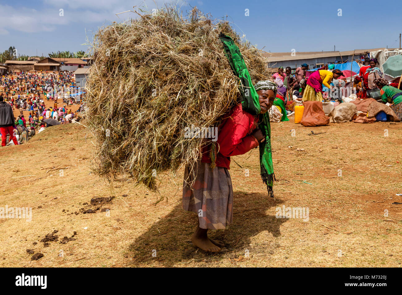 Traditional work in a tribal village of africa hi-res stock photography ...