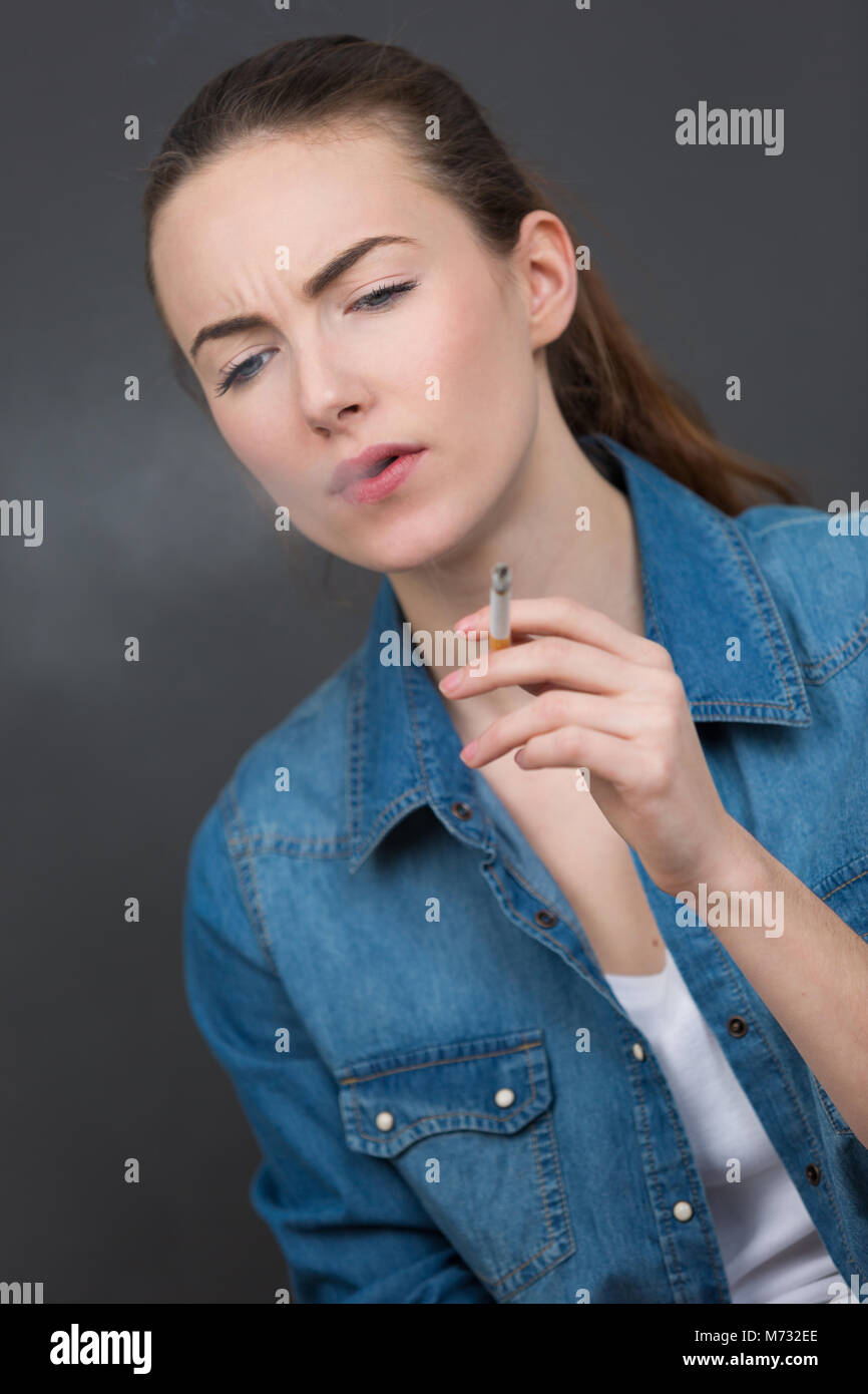 young woman smoking Stock Photo - Alamy