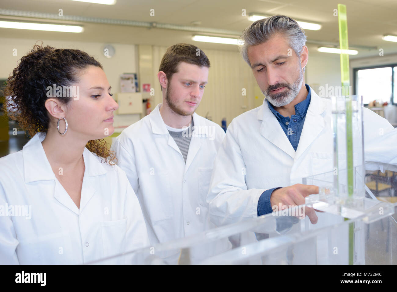 Scientist listening hi-res stock photography and images - Alamy