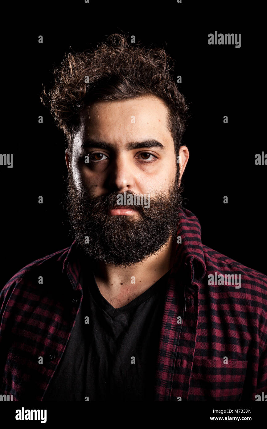 Portrait of bearded man on black background Stock Photo - Alamy