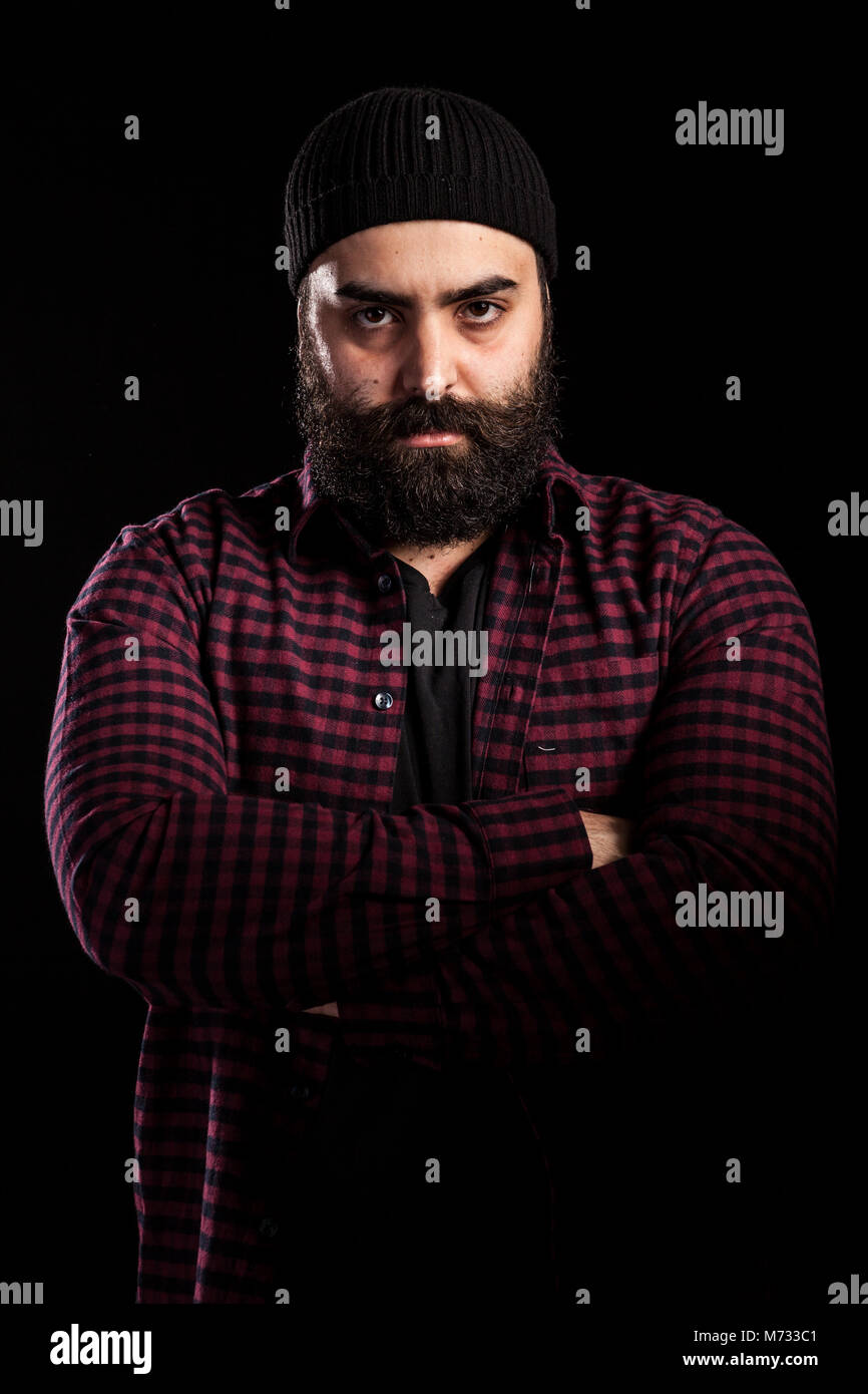 Portrait of angry bearded man Stock Photo - Alamy