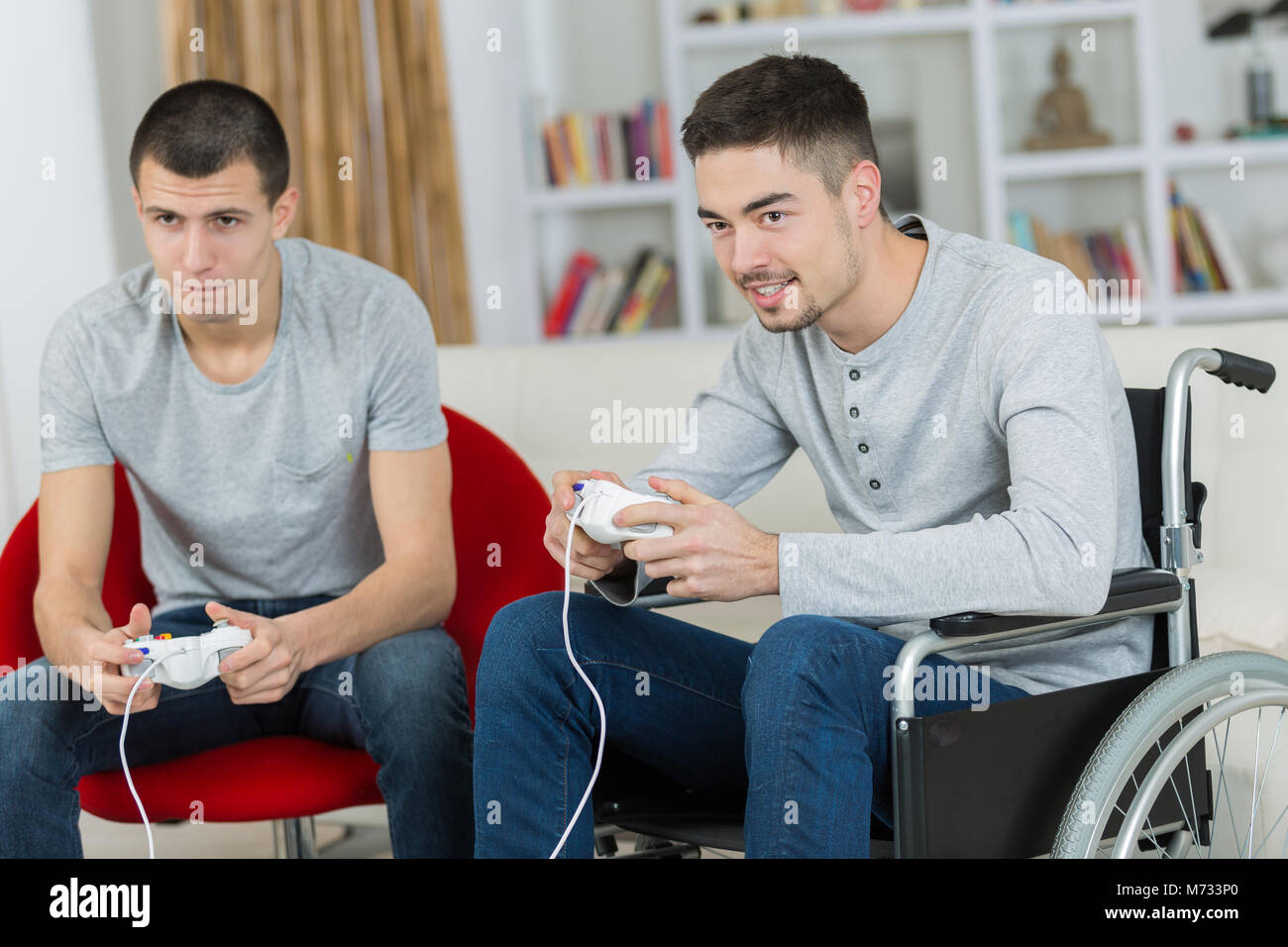 friends and video games Stock Photo - Alamy