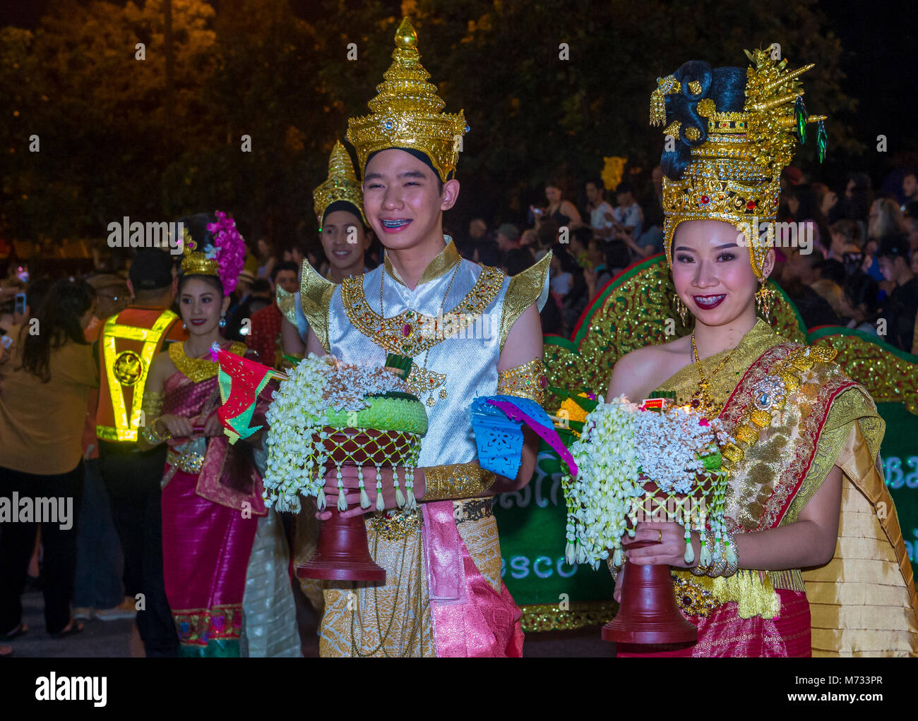 Participants in a parade during Yee Peng festival in Chiang Mai ...