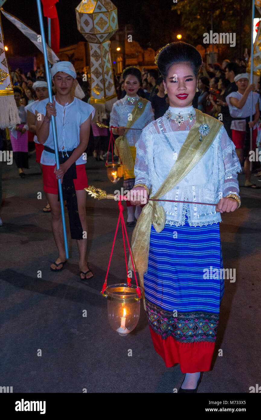 Participants in a parade during Yee Peng festival in Chiang Mai ...