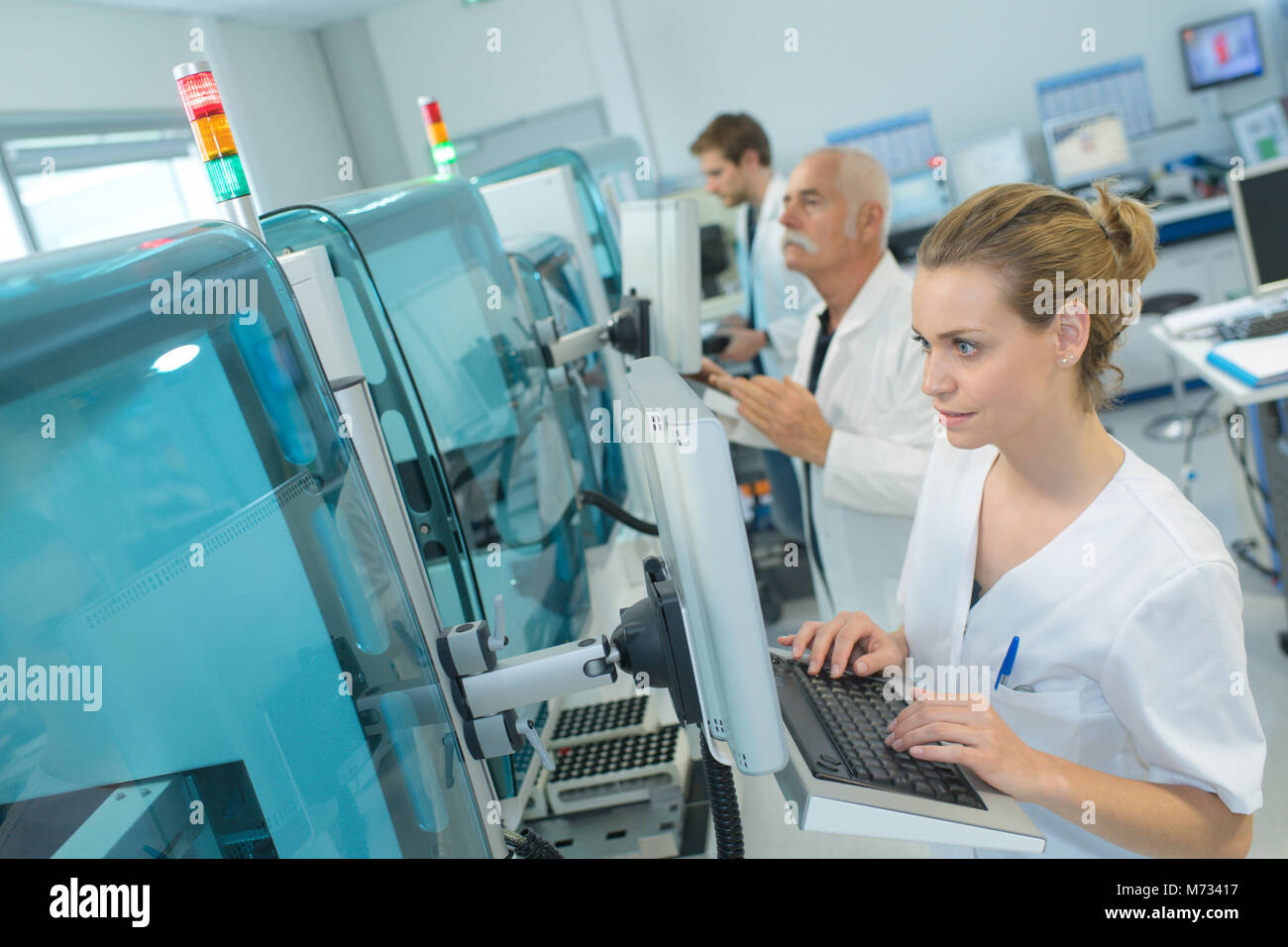 female researcher analyzing data Stock Photo - Alamy