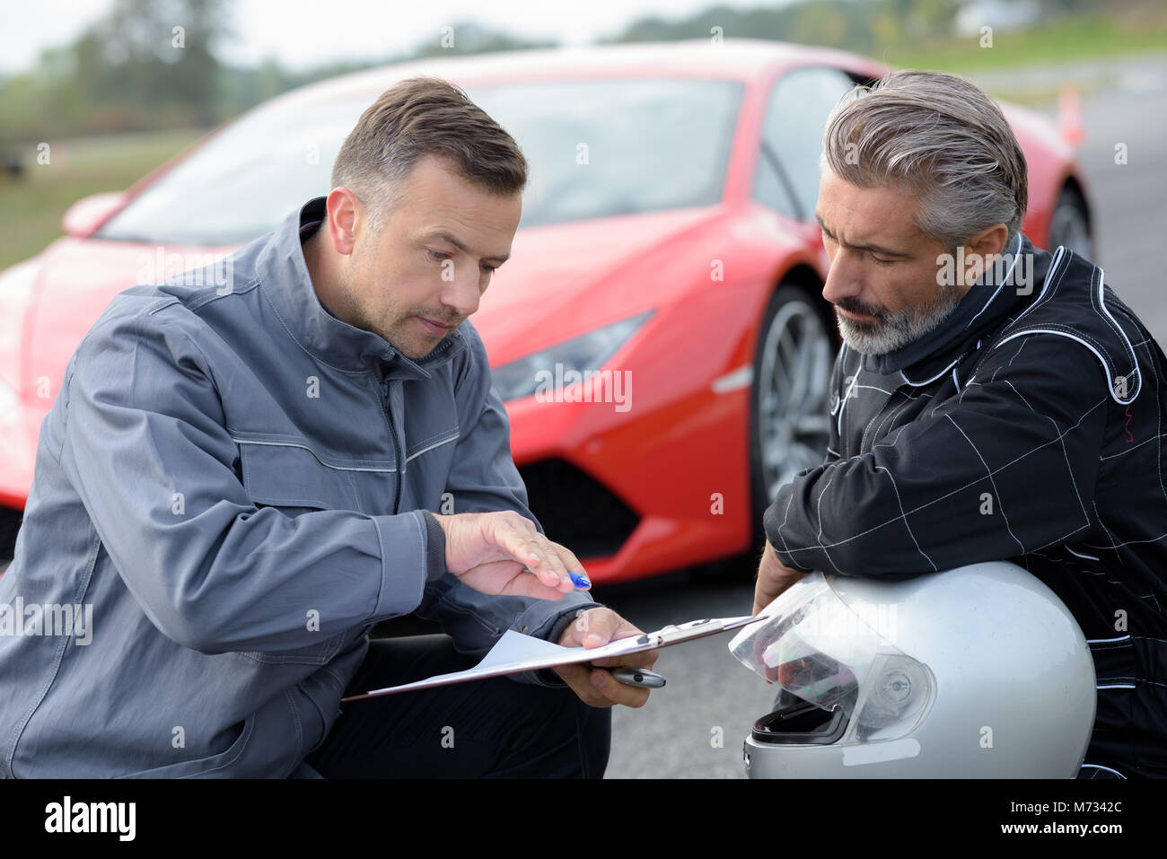 professional car driver with coach Stock Photo - Alamy