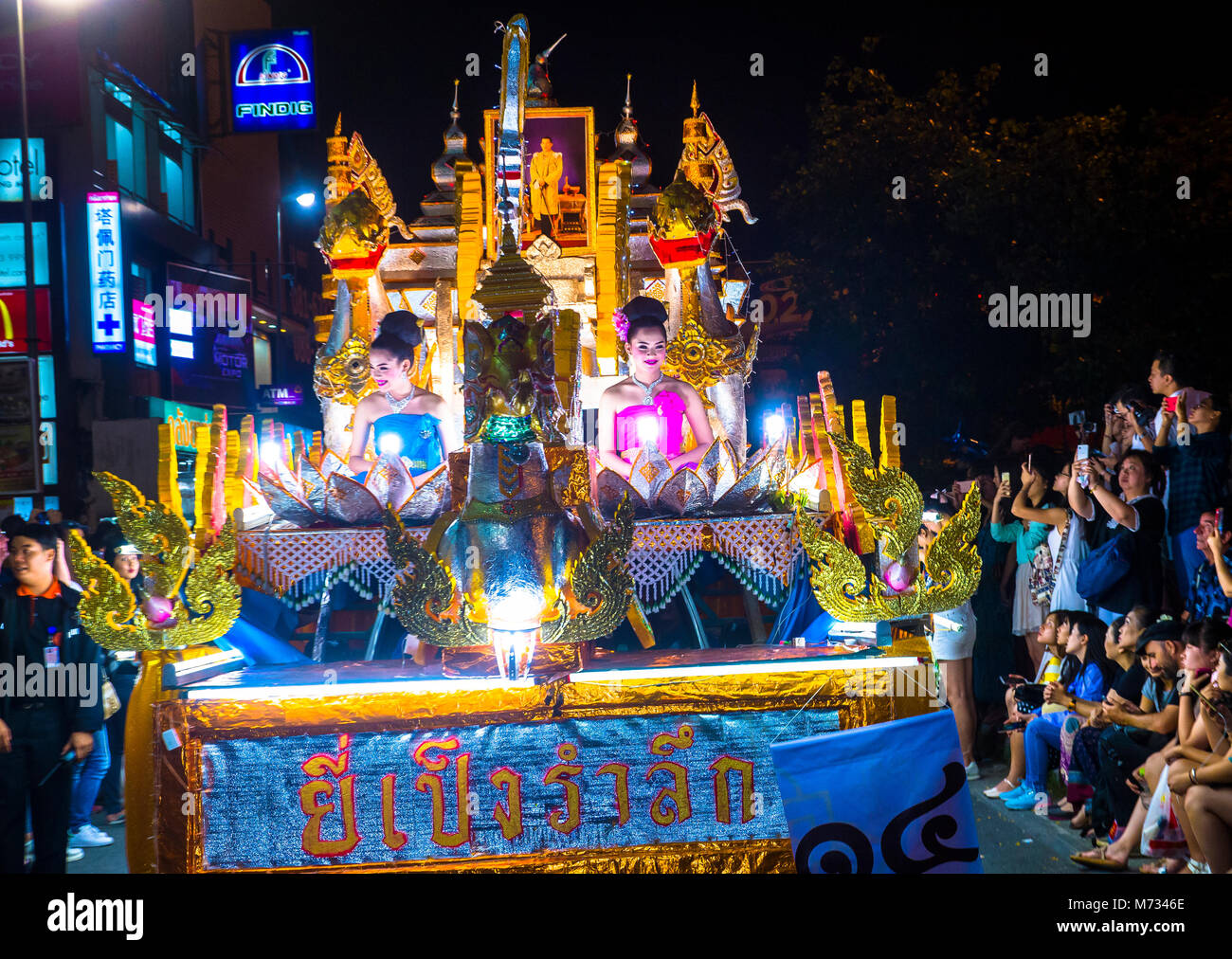 Participants in a parade during Yee Peng festival in Chiang Mai ...