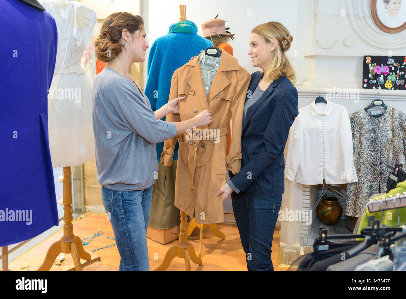 Female sales assistant in boutique hi-res stock photography and images ...