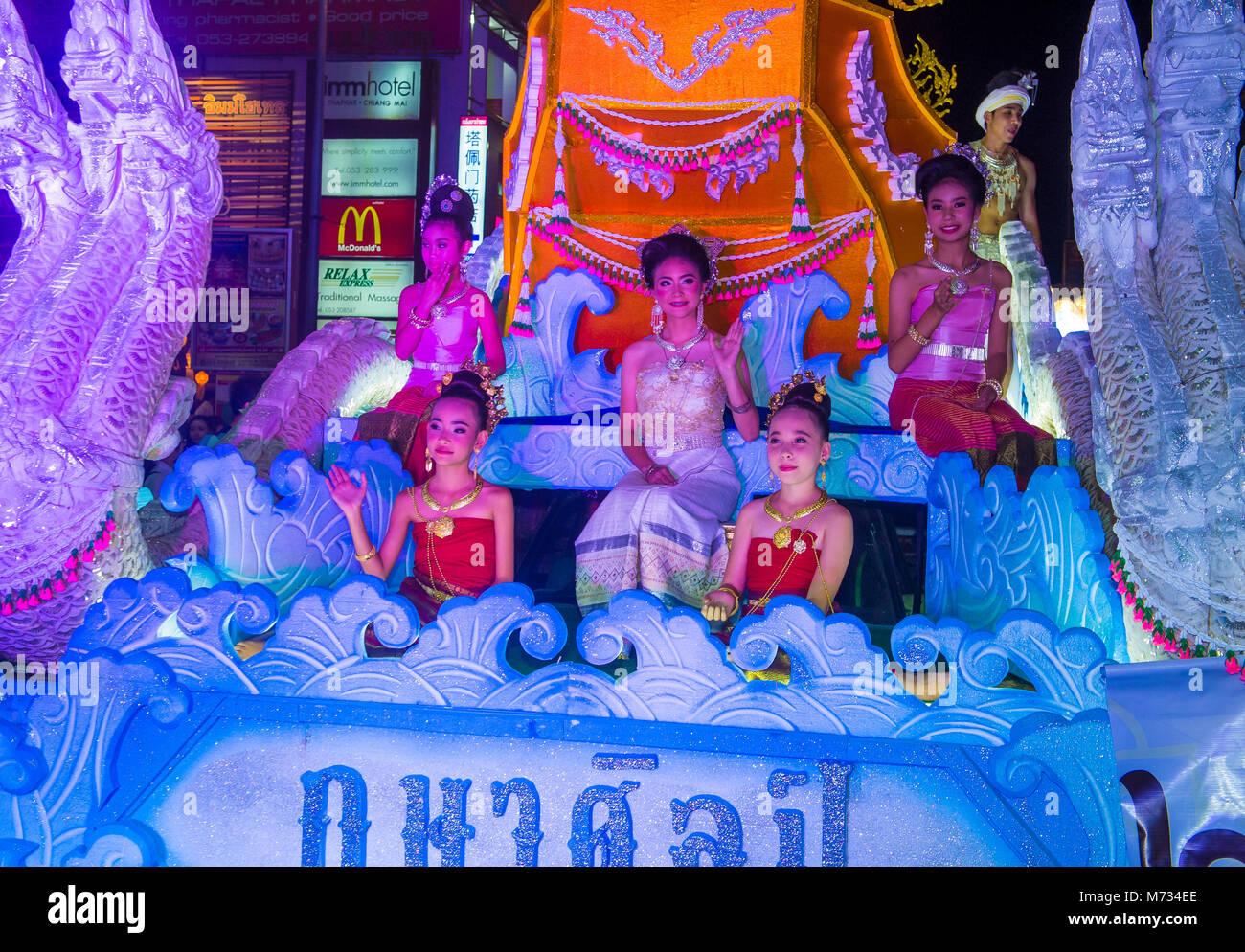 Participants in a parade during Yee Peng festival in Chiang Mai ...