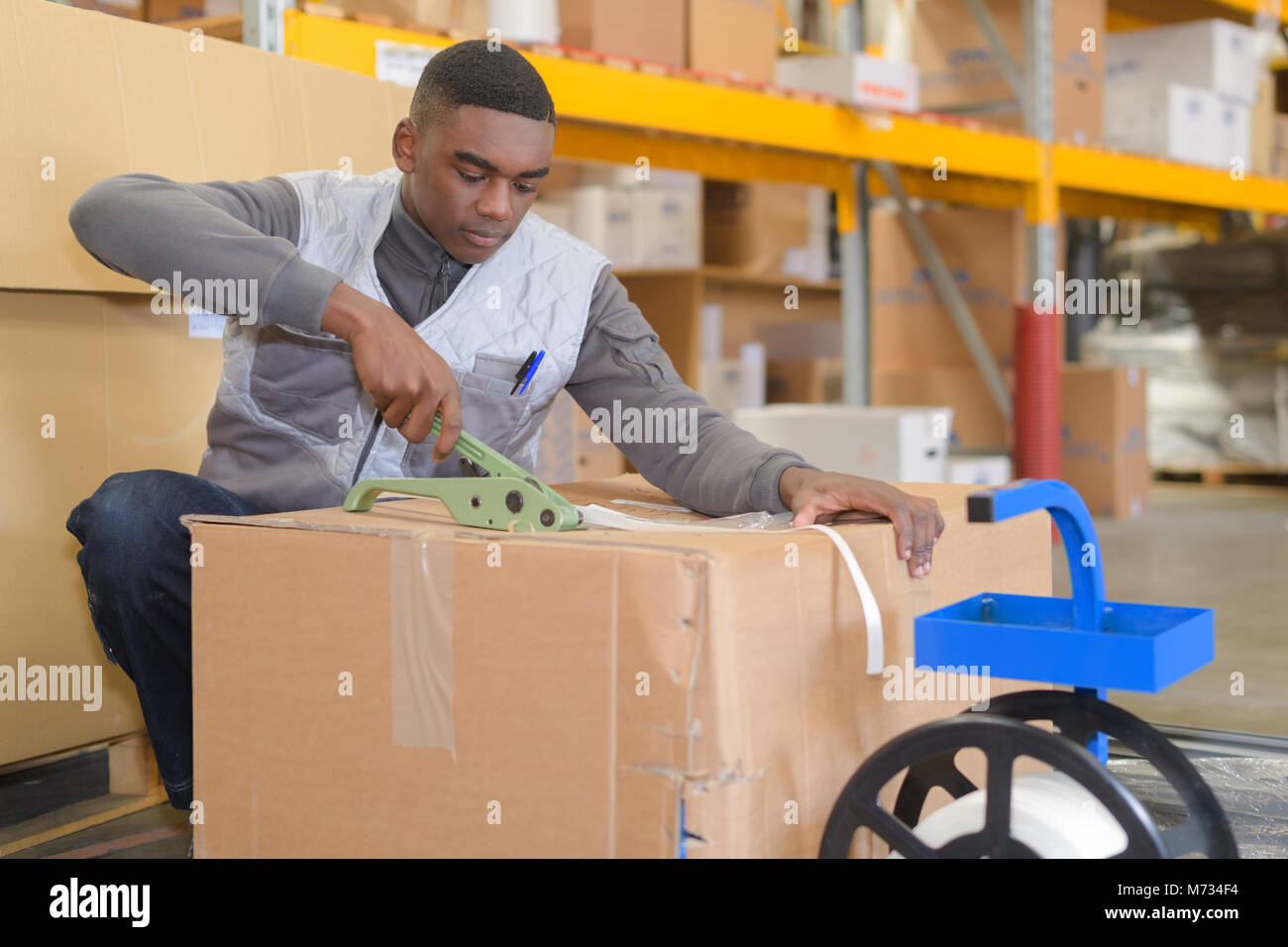 Warehouse worker hold carton hi-res stock photography and images - Alamy