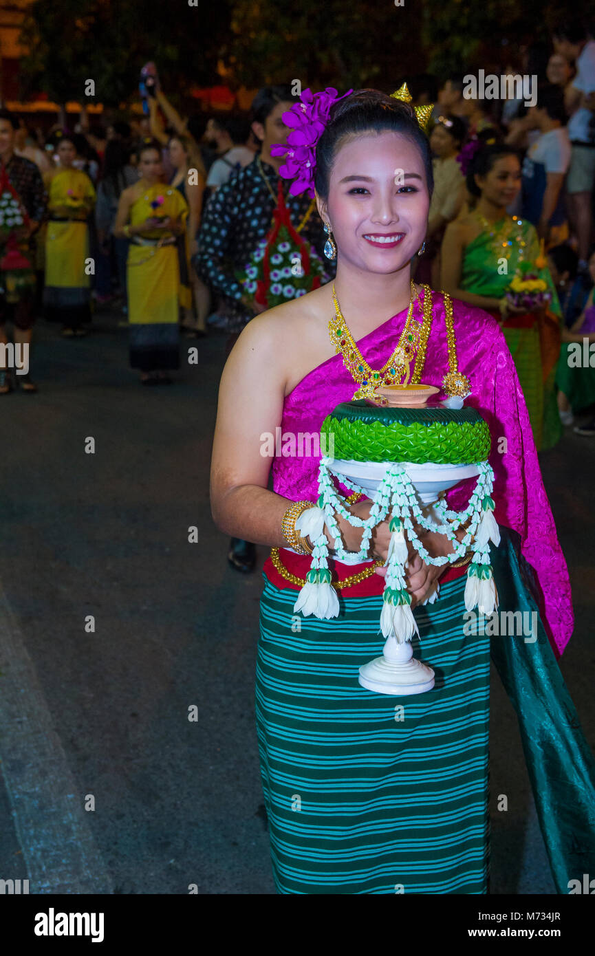 Participants in a parade during Yee Peng festival in Chiang Mai ...
