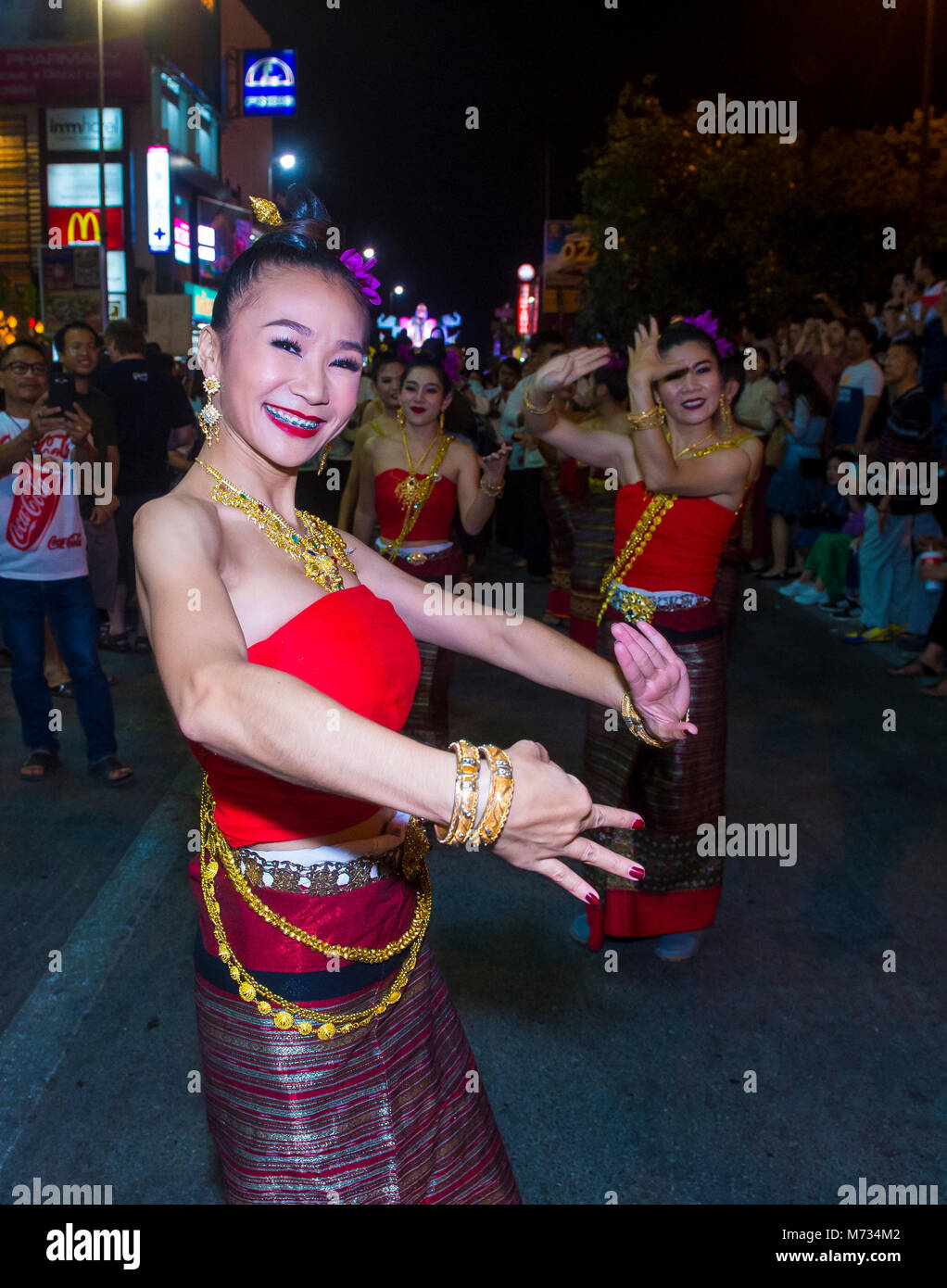 Participants in a parade during Yee Peng festival in Chiang Mai ...