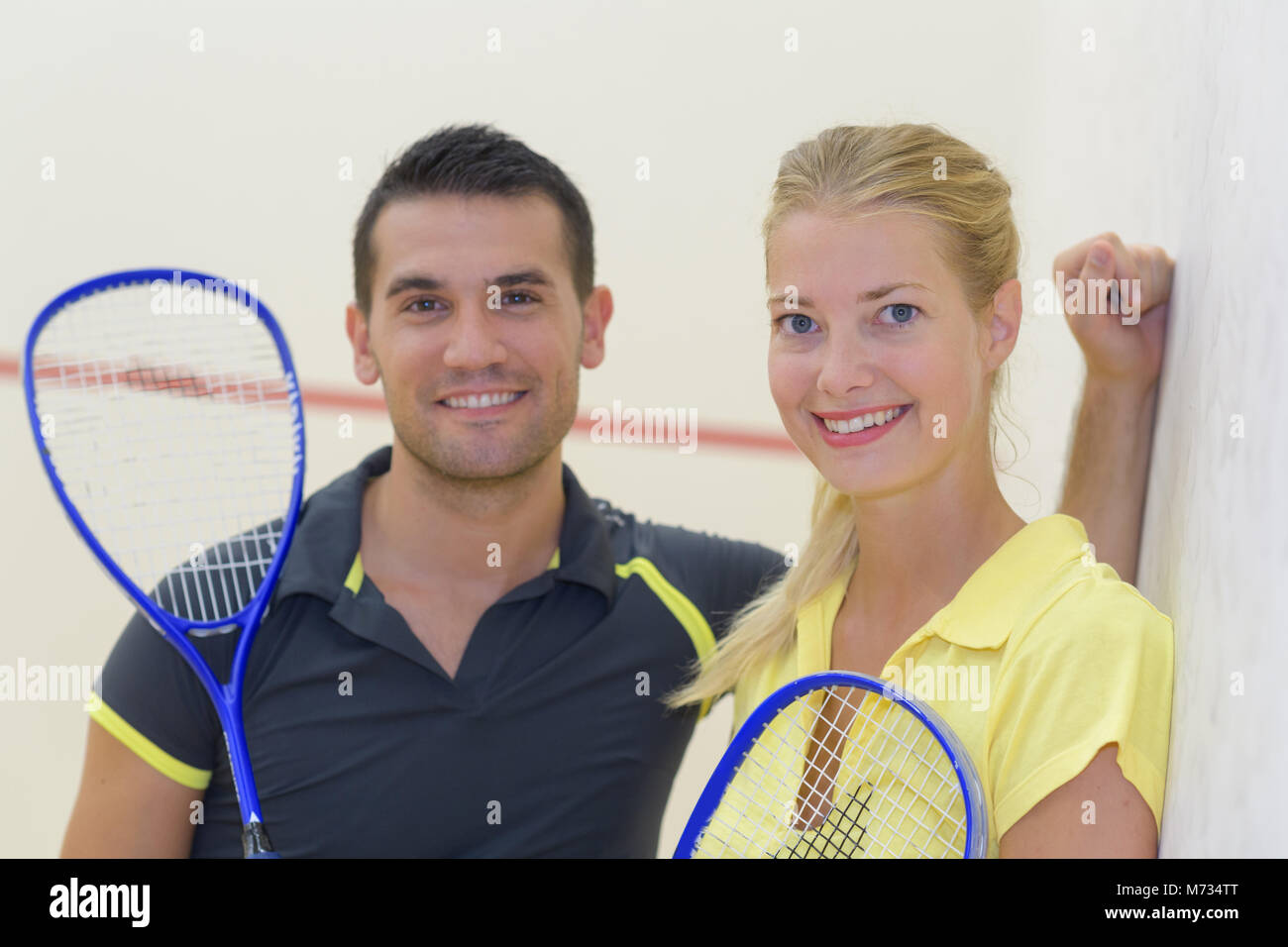 happy tennis couple Stock Photo - Alamy