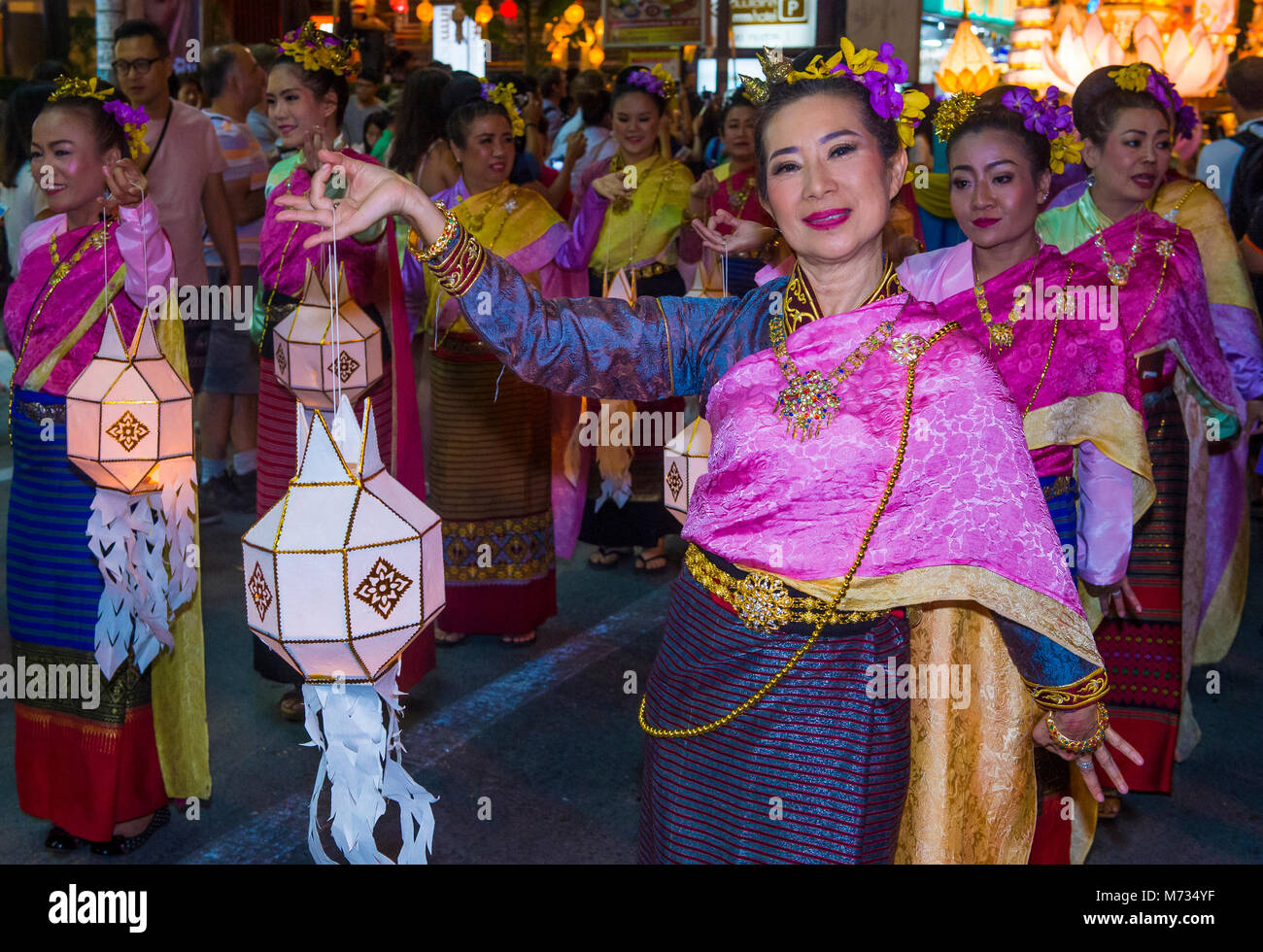 Participants in a parade during Yee Peng festival in Chiang Mai ...