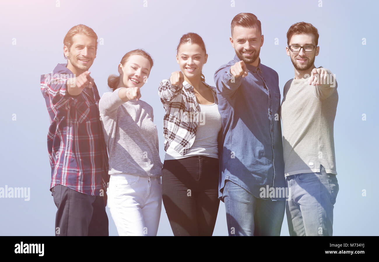confident young people showing hands forward .isolated on a blue ...