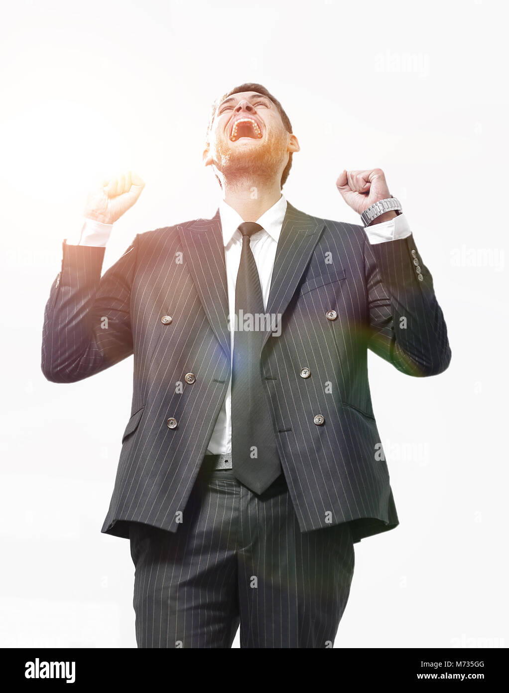 in full growth. portrait, triumphant businessman ,isolated on white ...