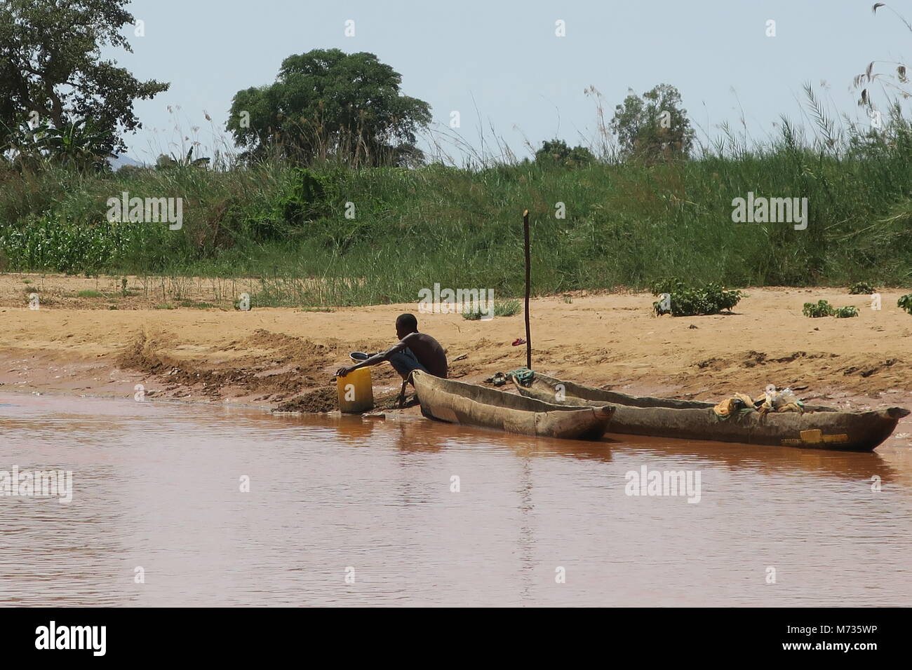 Pirogue, dugout, canoe on Tsiribihina river, Madagascar Stock Photo - Alamy