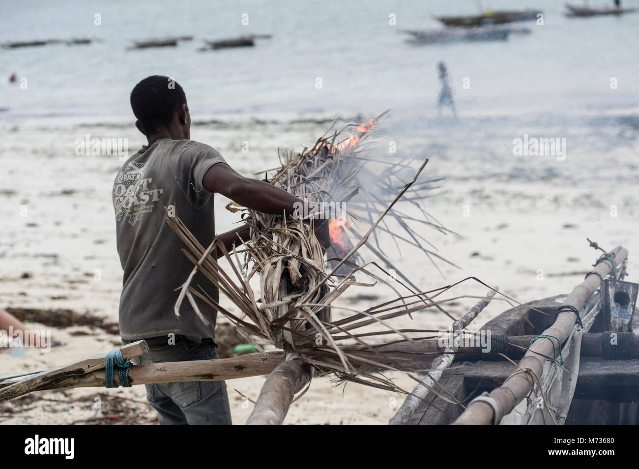 Burning dried coconut leaves hi-res stock photography and images - Alamy