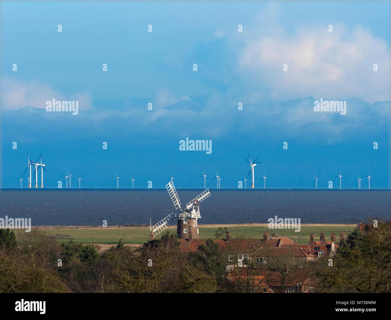 Cley windmill with the sheringham shoal windfarm in distance Stock ...