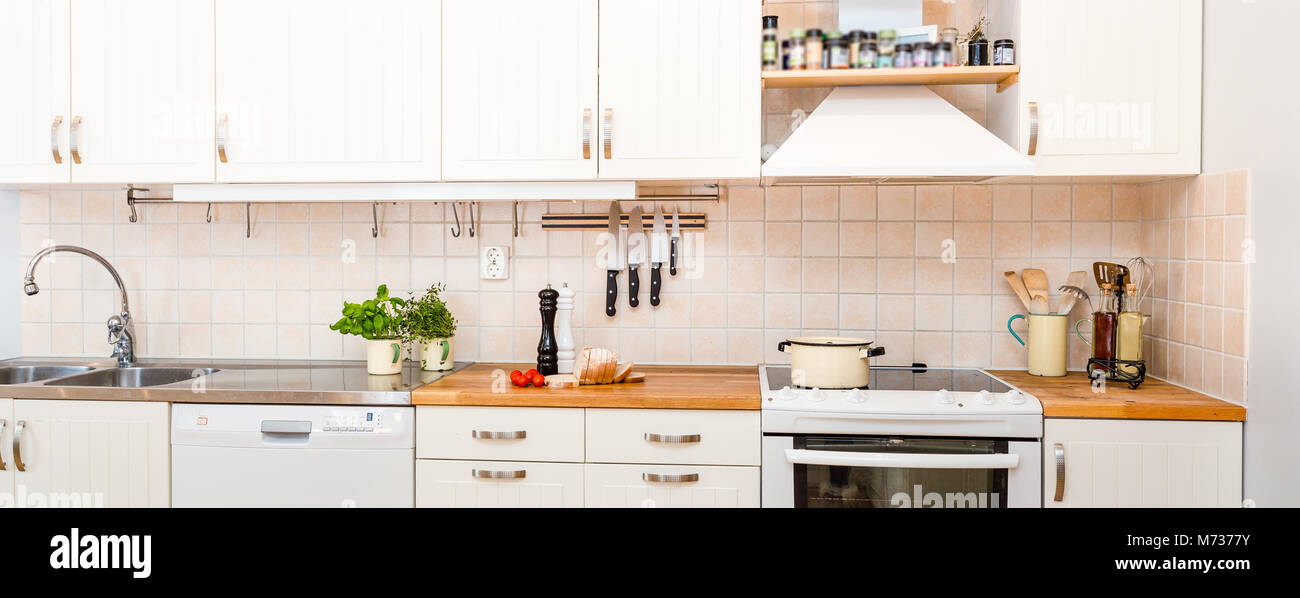banner detail of kitchen countertop with ingridients on the counter top ...