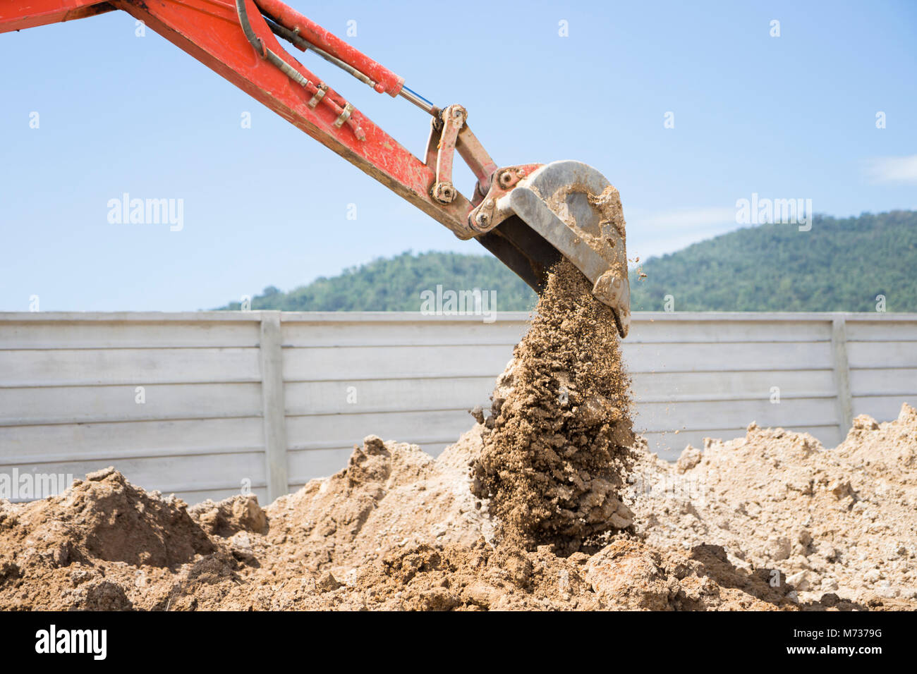Excavator working at construction site ; outdoor Stock Photo - Alamy