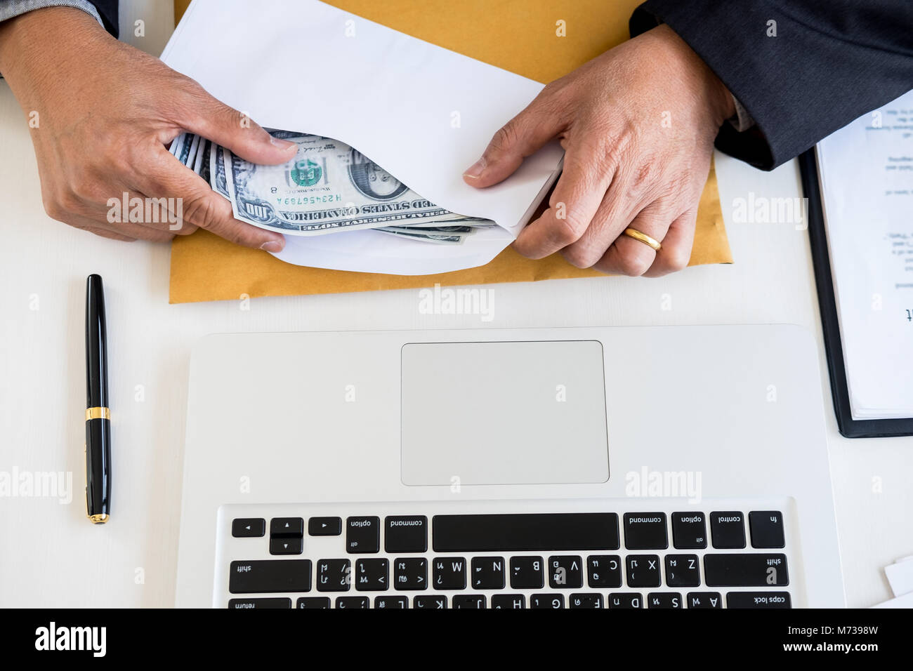business man counting money at the table, accounting concept Stock ...