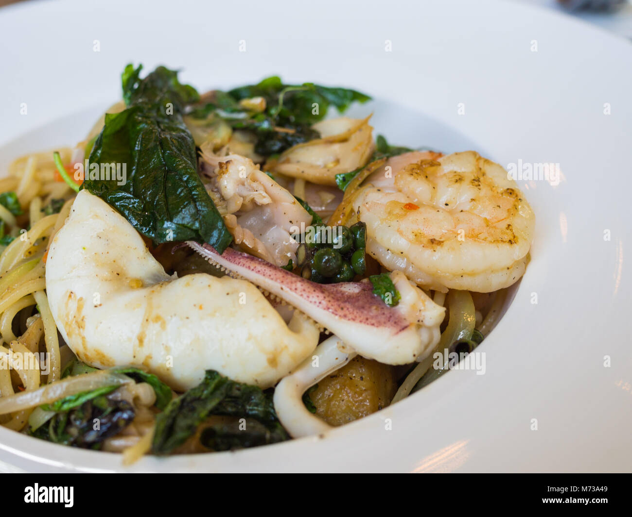 Spaghetti Kee Mao, basil and chill dried with spaghetti Stock Photo - Alamy