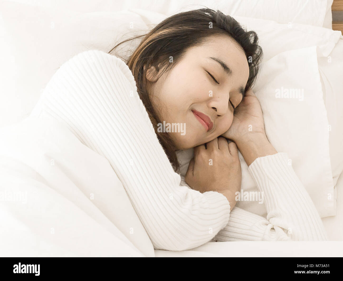 women sleep on bed in bedroom Stock Photo - Alamy
