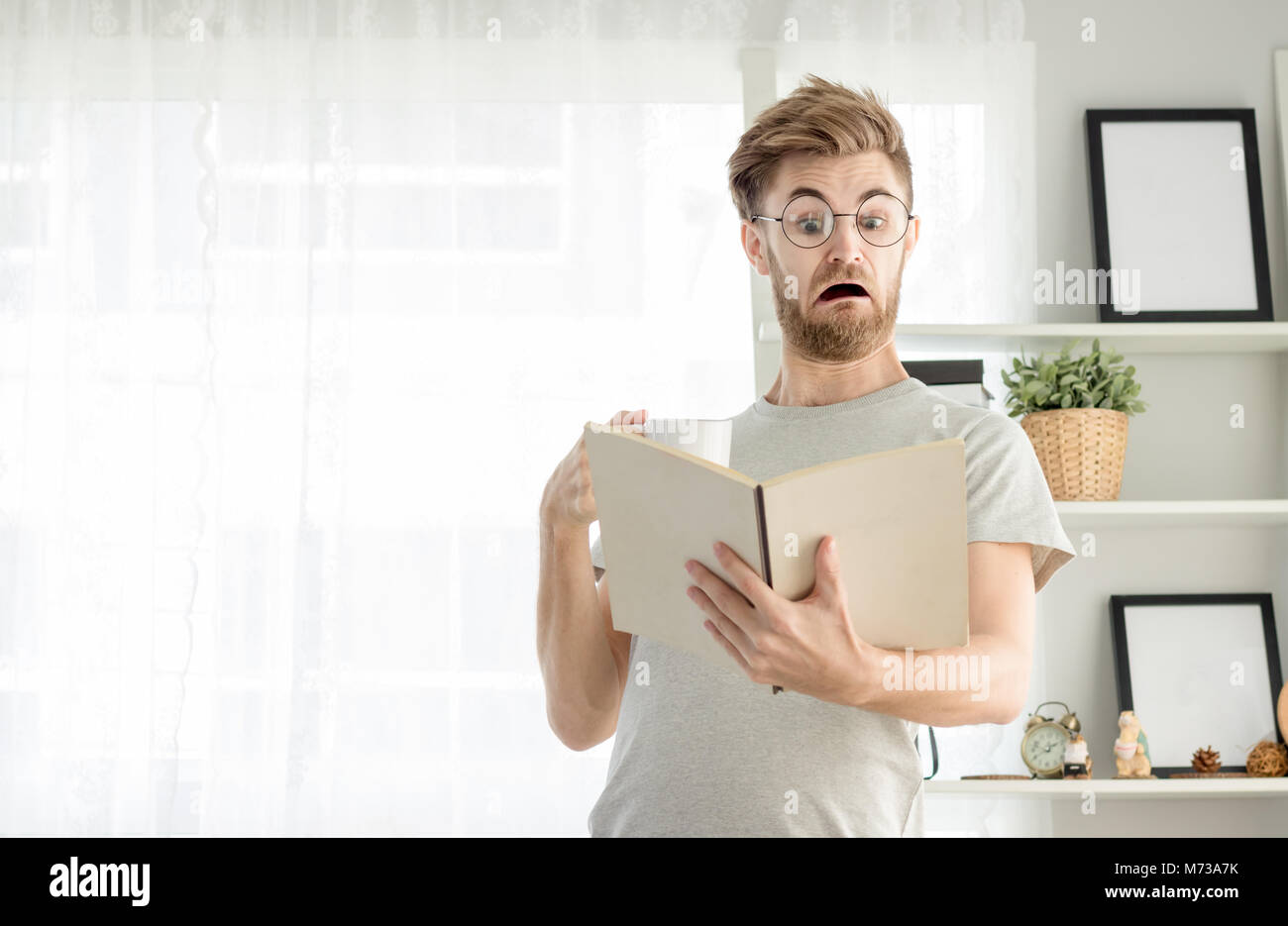 Man reading paper in bed hi-res stock photography and images - Alamy