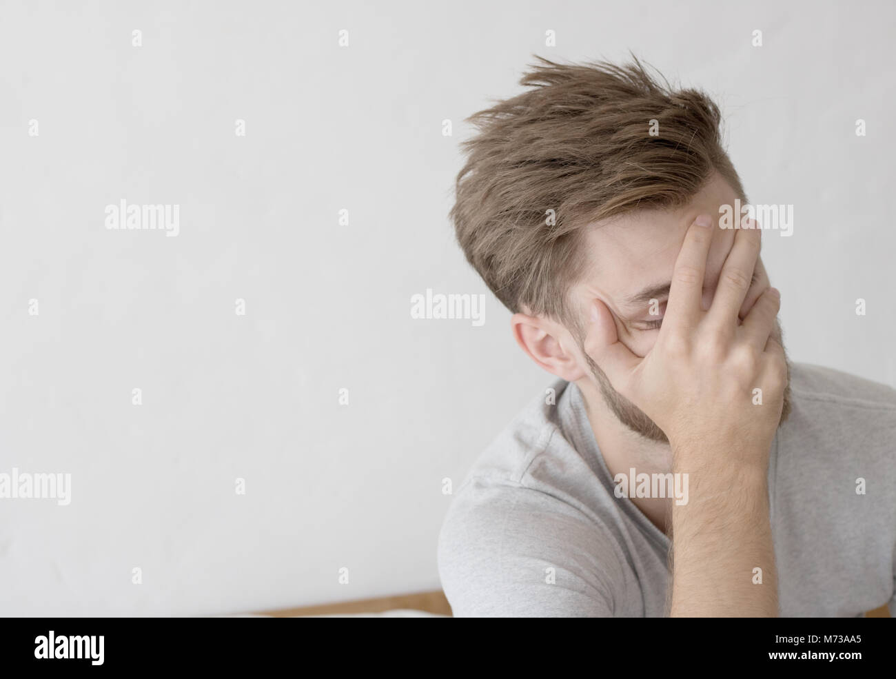 Men are stressed after wake up Stock Photo - Alamy
