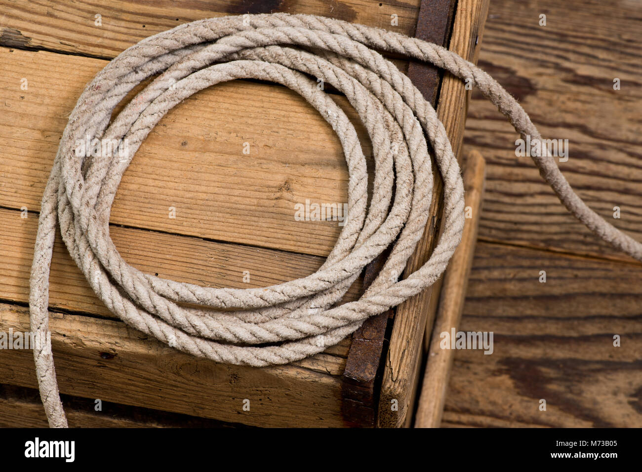 Detail of Old Rope on the Wooden Desk Stock Photo - Alamy