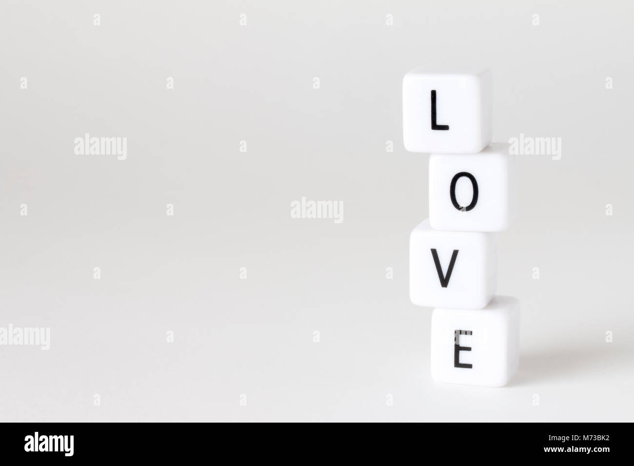 White cube written as LOVE Stock Photo - Alamy