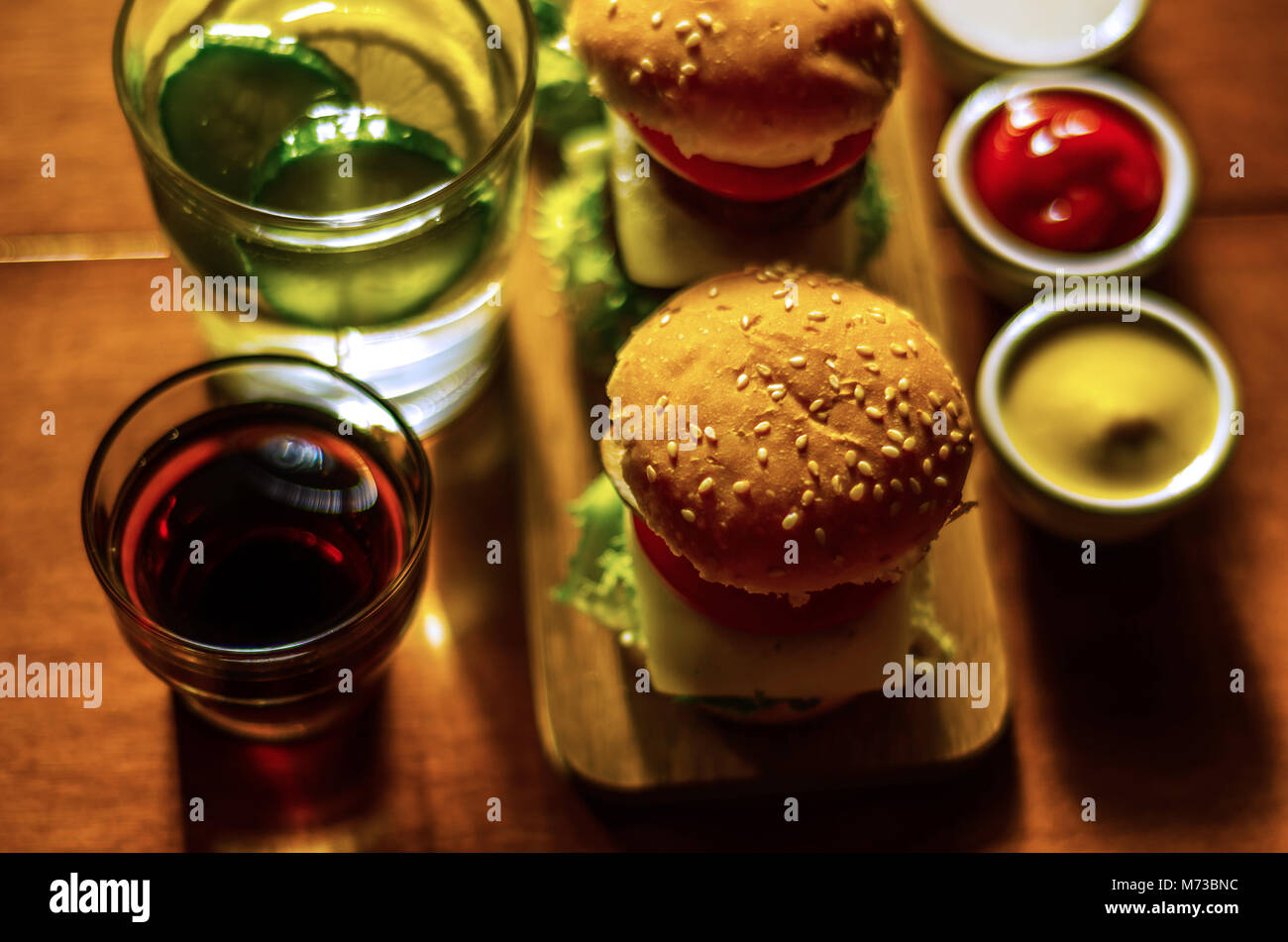 mini burgers with meat, vegetables, cheese and other toppings, bread ...