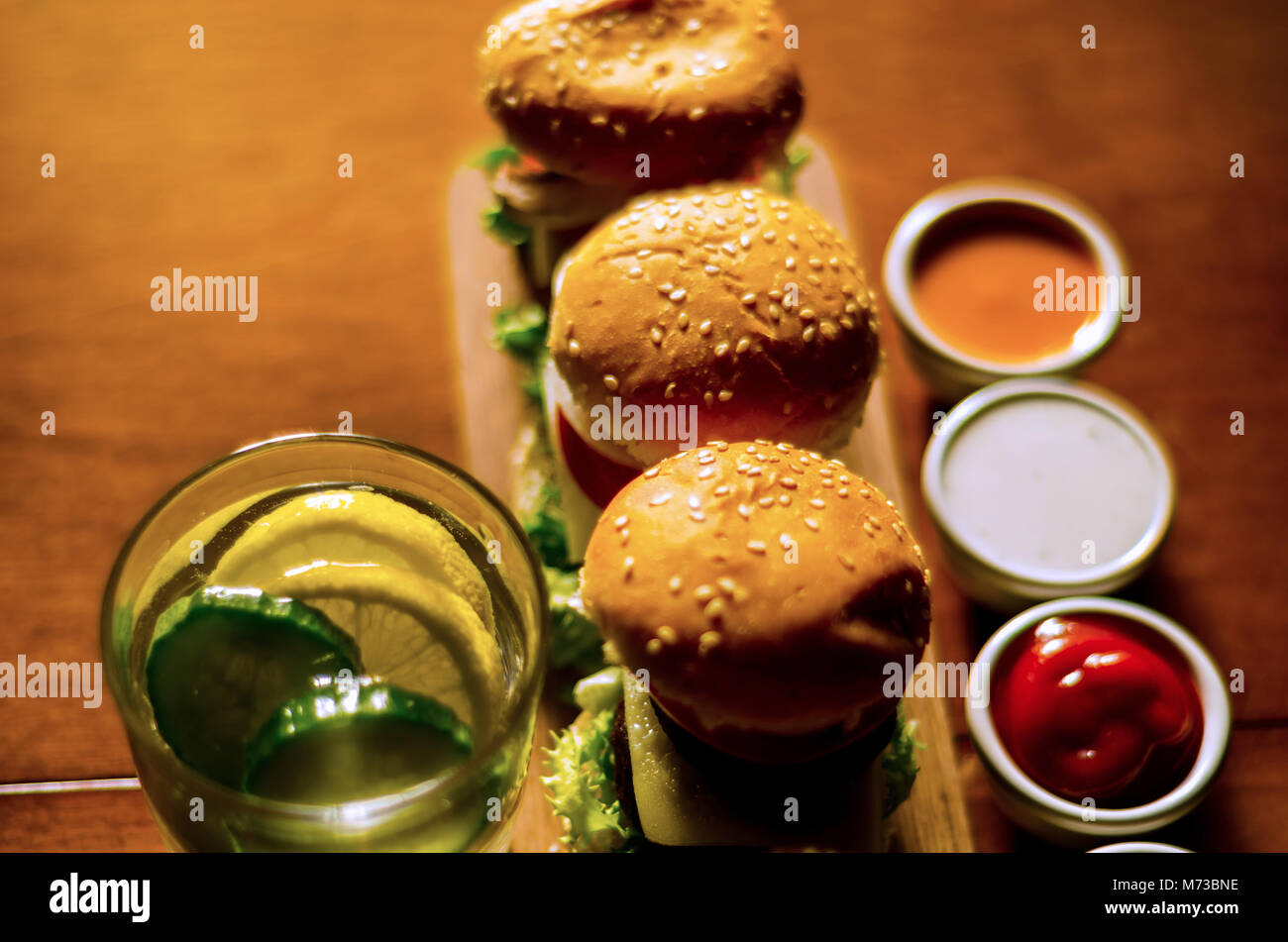 mini burgers with meat, vegetables, cheese and other toppings, bread ...