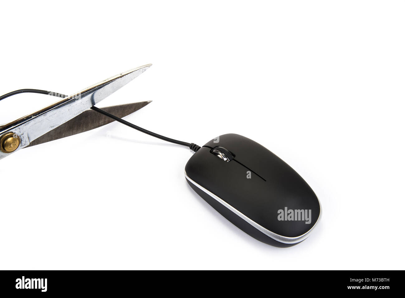 Computer mouse with black cable and scissors. Cut out or wireless ...