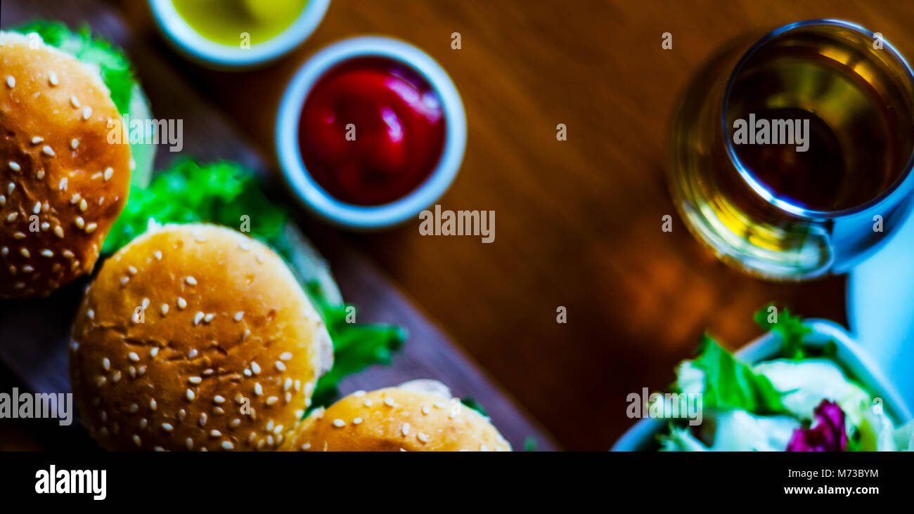 mini burgers with meat, vegetables, cheese and other toppings, bread ...