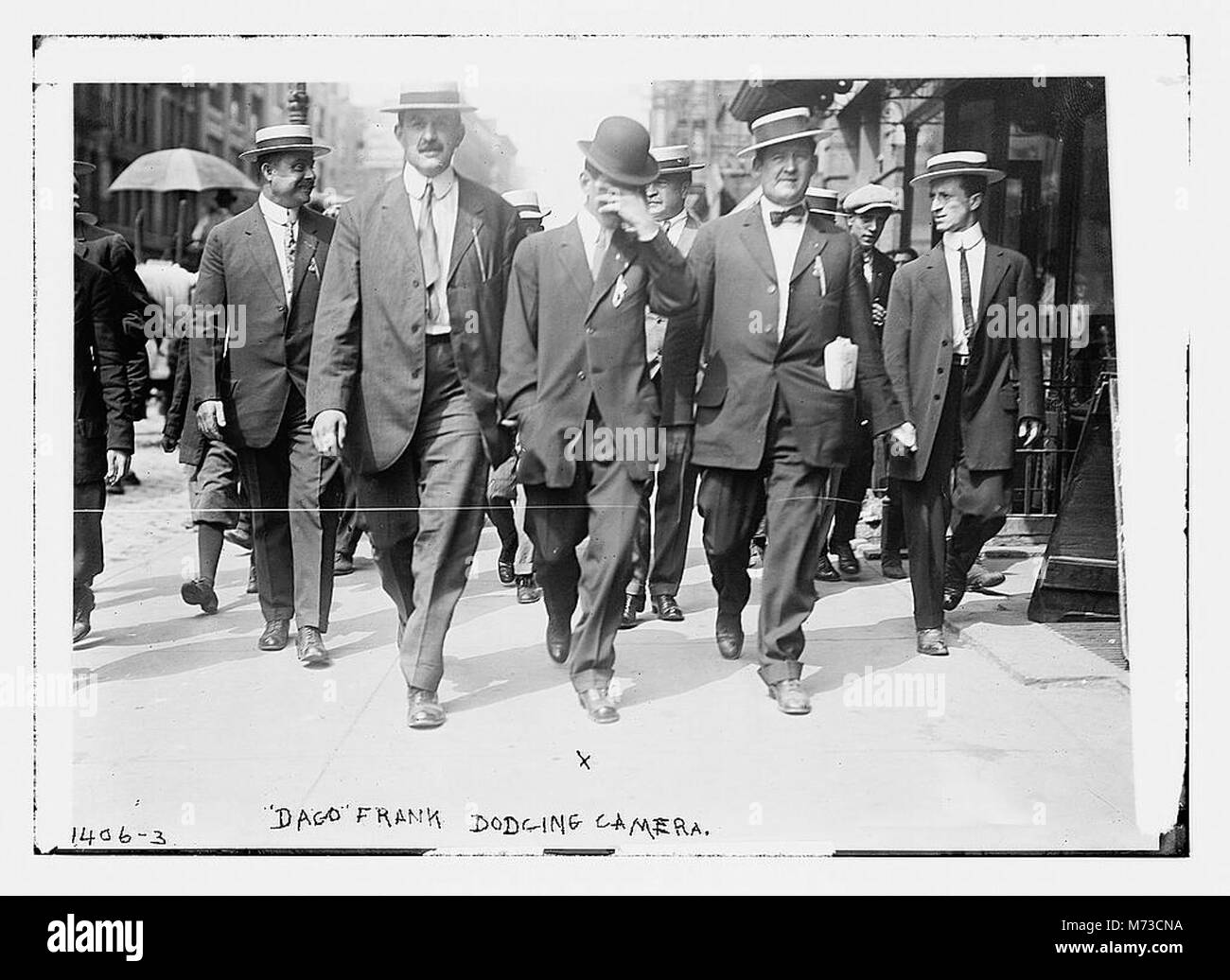 A candid photograph of ‘Dago’ Frank, a notorious figure, avoiding the ...